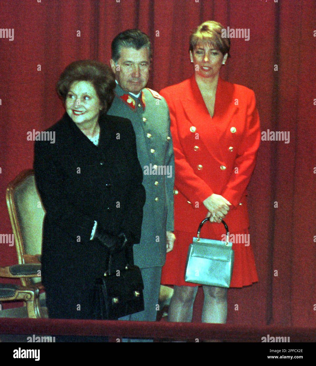 The wife of Gen. Augusto Pinochet, Lucia Hiriart, left, smiles at the ...