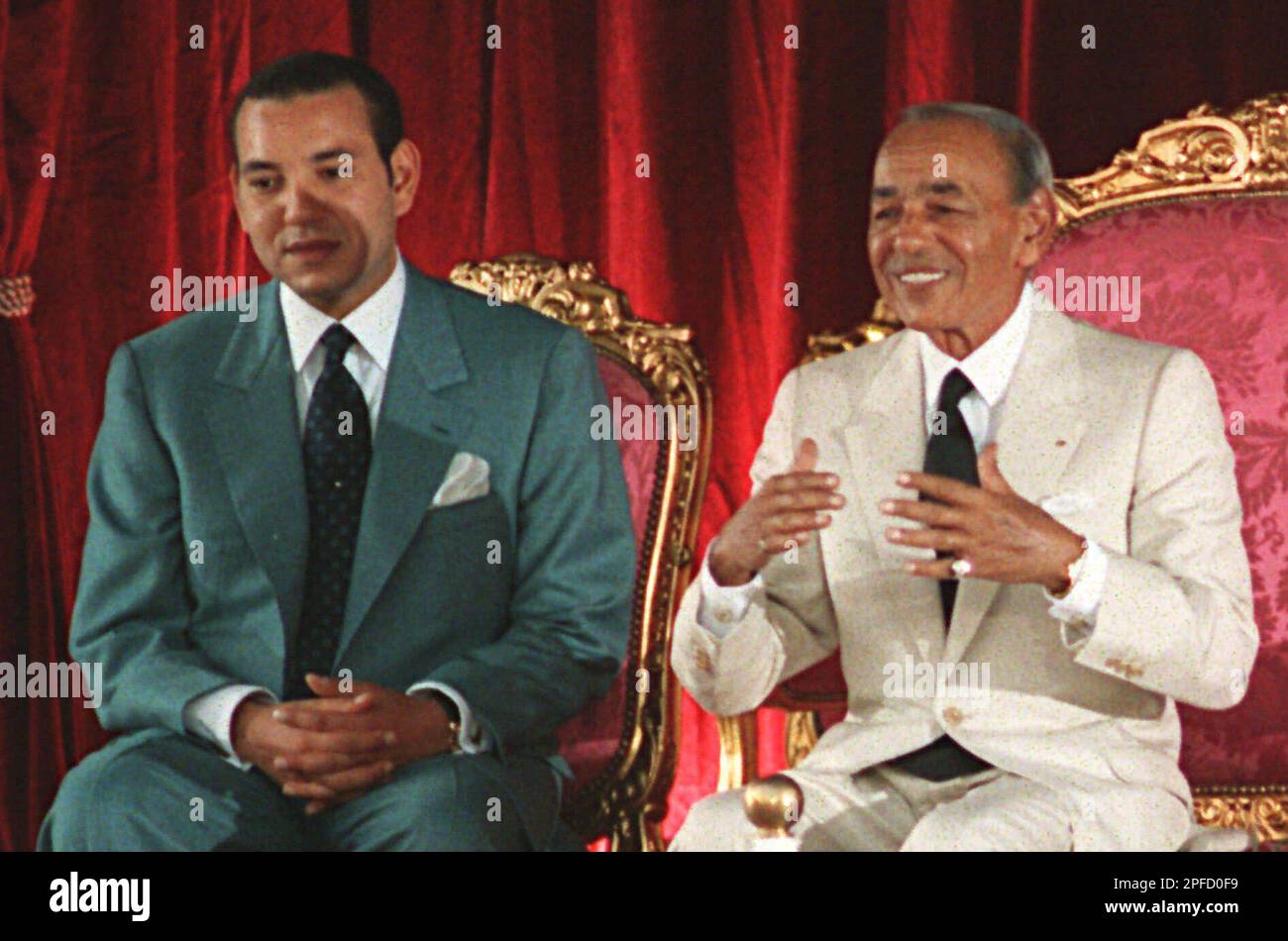 King Hassan II of Morocco, right, sits with his son Crown Prince Sidi ...