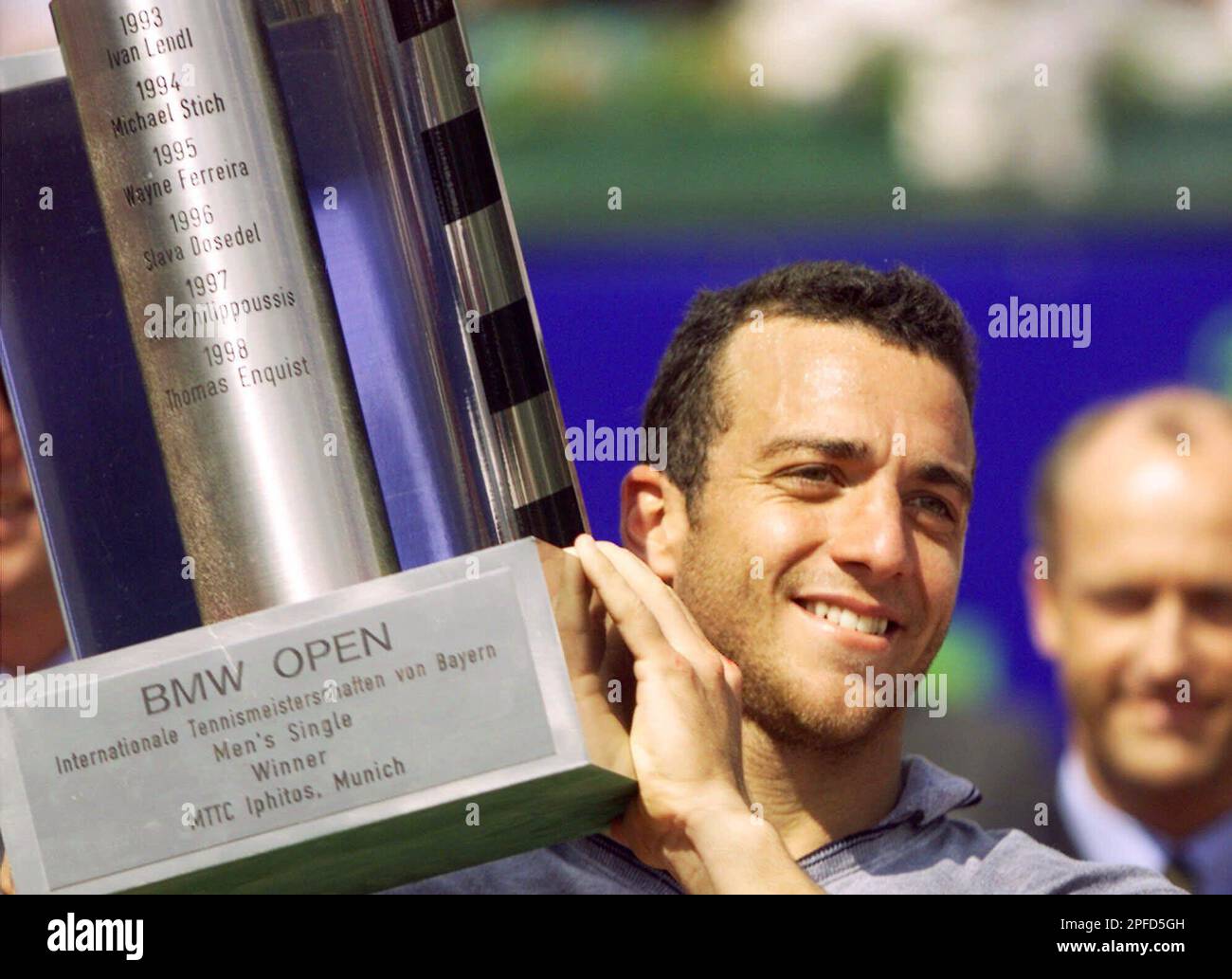 Franco Squillari of Argentina holds his trophy after winning the ...
