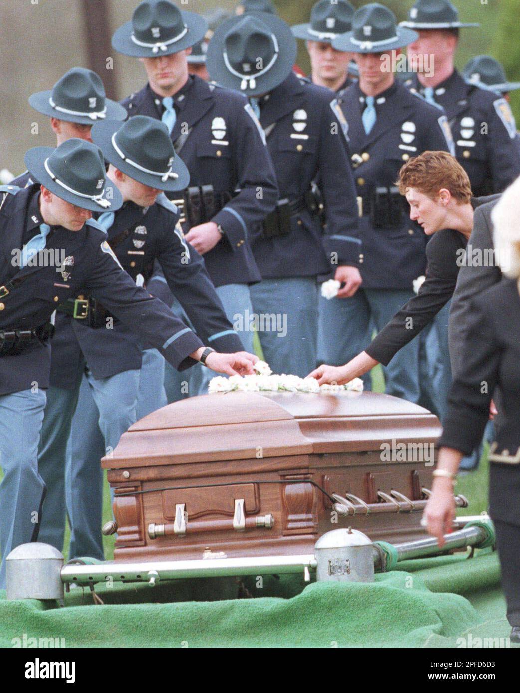 Indiana state police place flowers on the casket of slain Trooper Cory ...