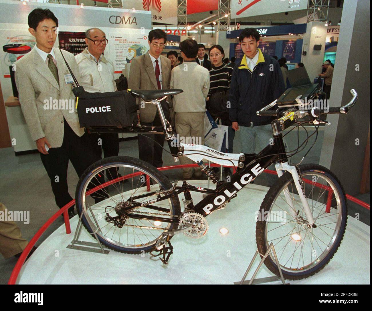 Chinese look at a police bicycle, complete with mini-computer and ...