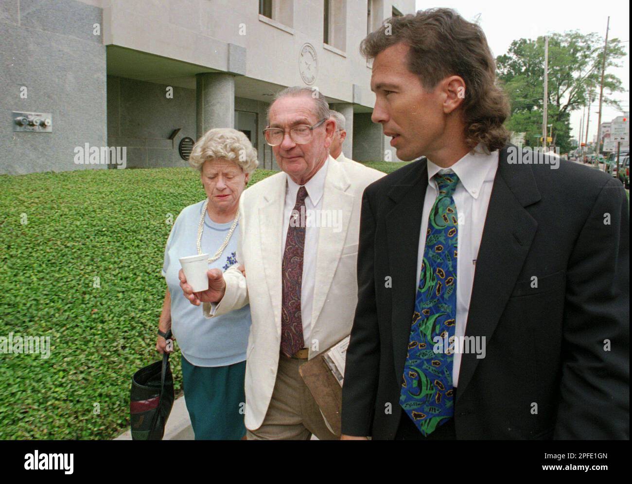 Byron De La Beckwith, center, walks with his wife Thelma and his ...