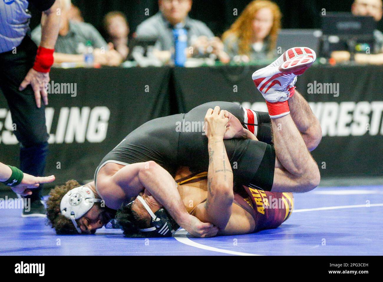 Ohio State's Sammy Sasso attempts to pin Arizona State's Kyle Parco ...