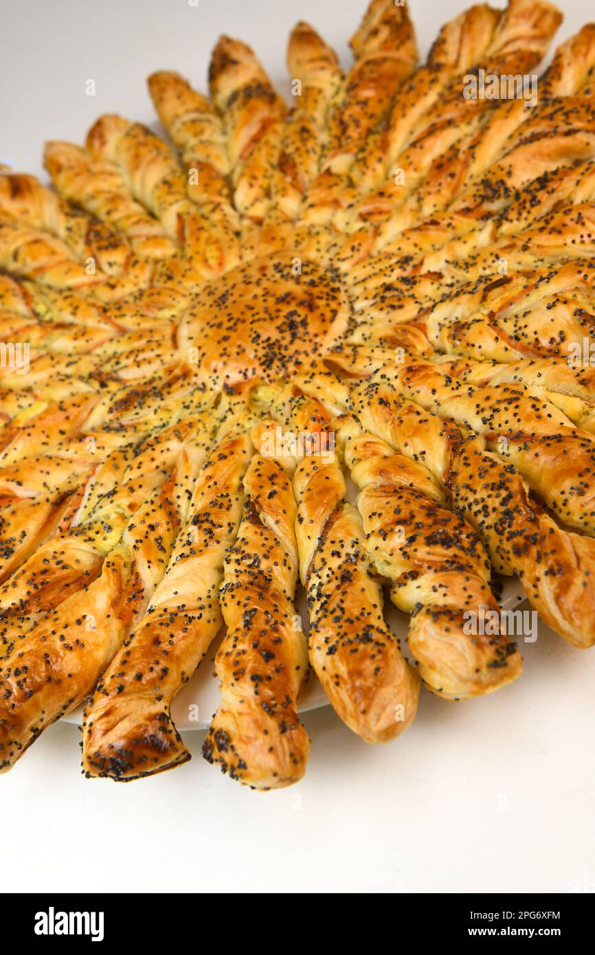 Recette du soleil en pâte feuilletée avec saumon fumé et fromage ...