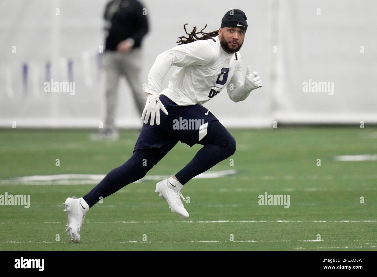 Defensive back Jonathan Sutherland runs a drill during Penn State's ...