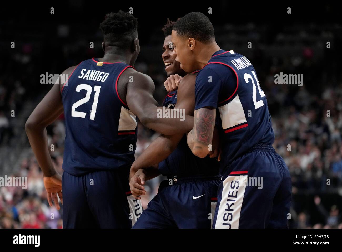UConn forward Adama Sanogo (21), guard Nahiem Alleyne, middle, and ...