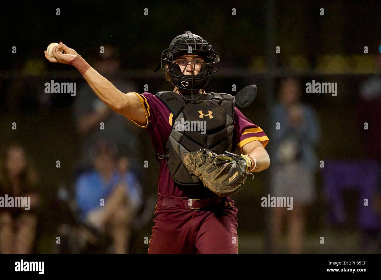 Minnesota Morris Cougars catcher Keegan Jonas (10) throws to first base ...
