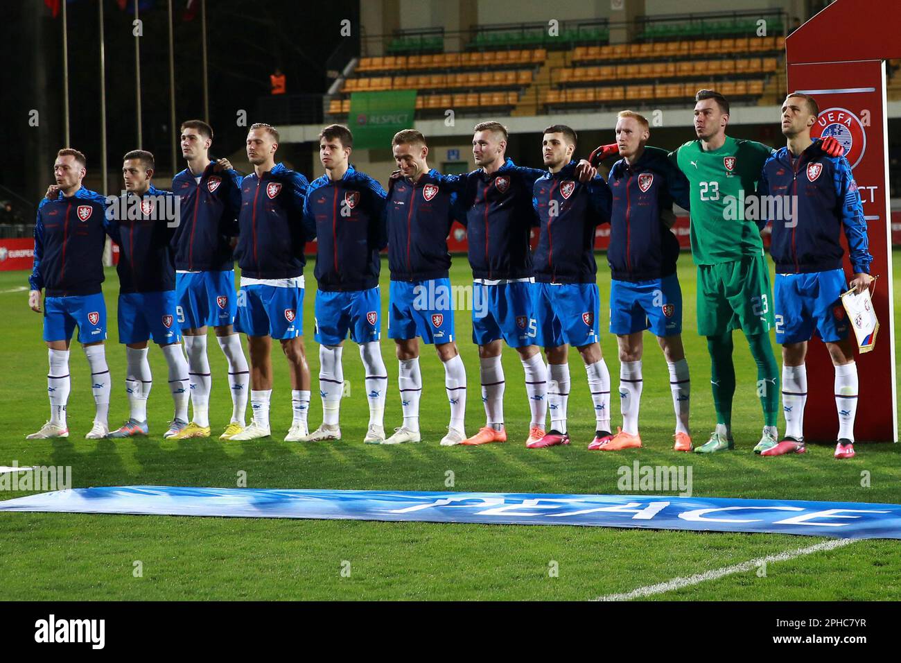 Czech players, left, and Moldovan players stand during the national ...