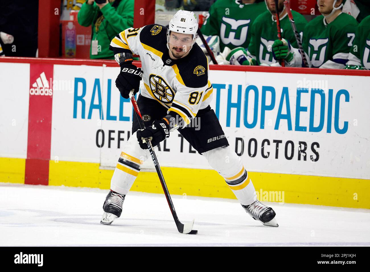 Boston Bruins' Dmitry Orlov (81) skates with the puck against the ...