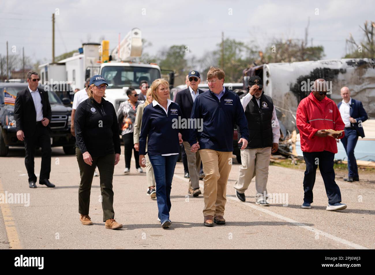 Mississippi Gov. Tate Reeves, accompanied by wife Elee Reeves, walks ...