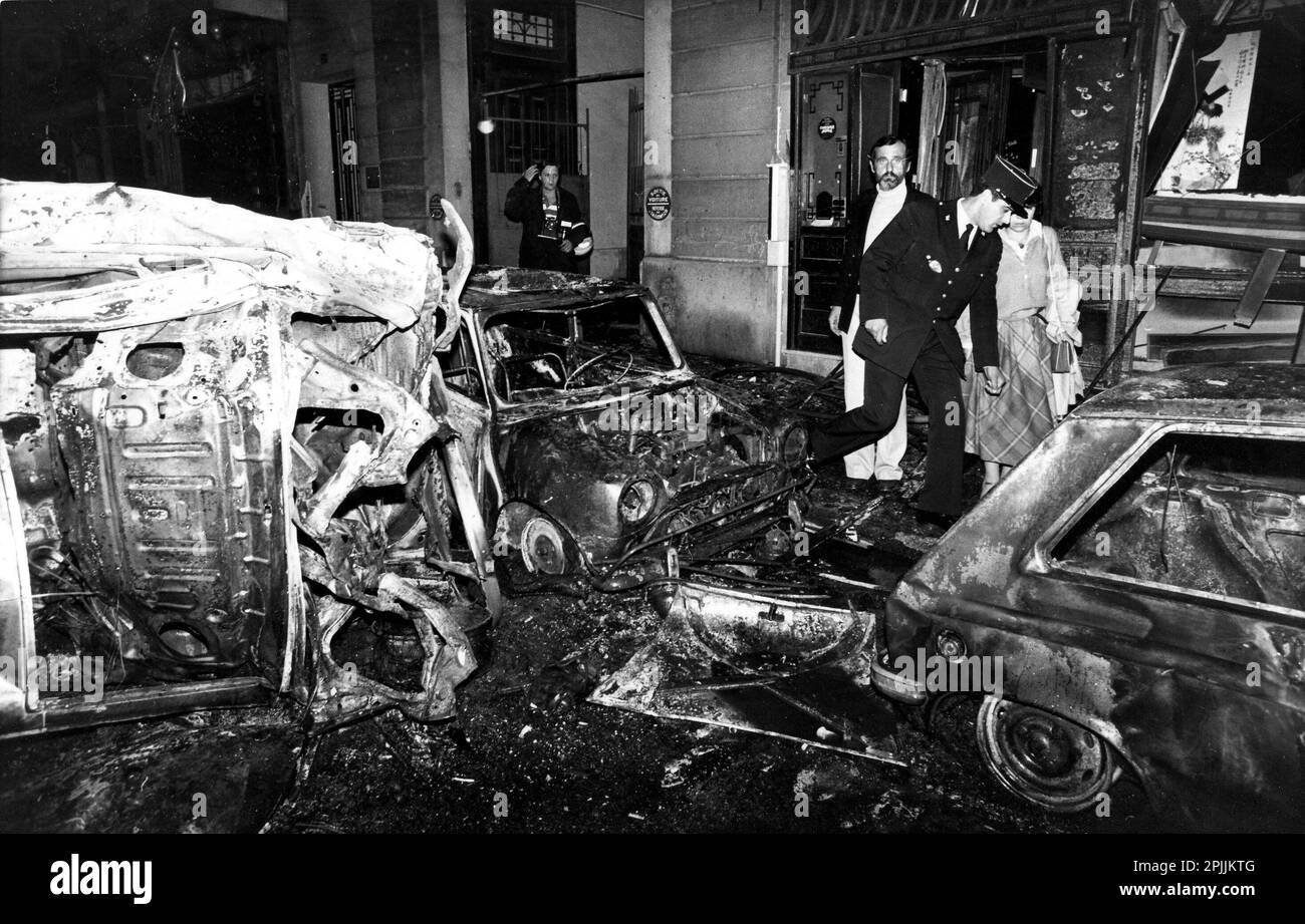 FILE - A police officer walks at the scene after the bombing of the ...