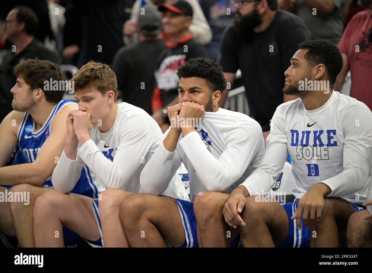 Duke center Ryan Young (15), guard Jaden Schutt, second from left ...