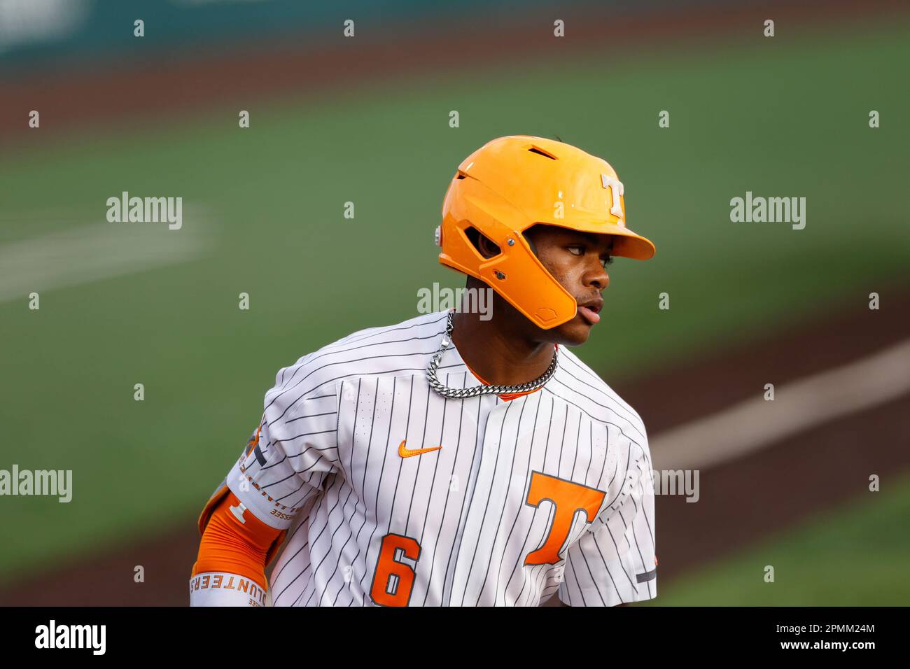 Tennessee Volunteers center fielder Kyle Booker (6) hustles to first ...