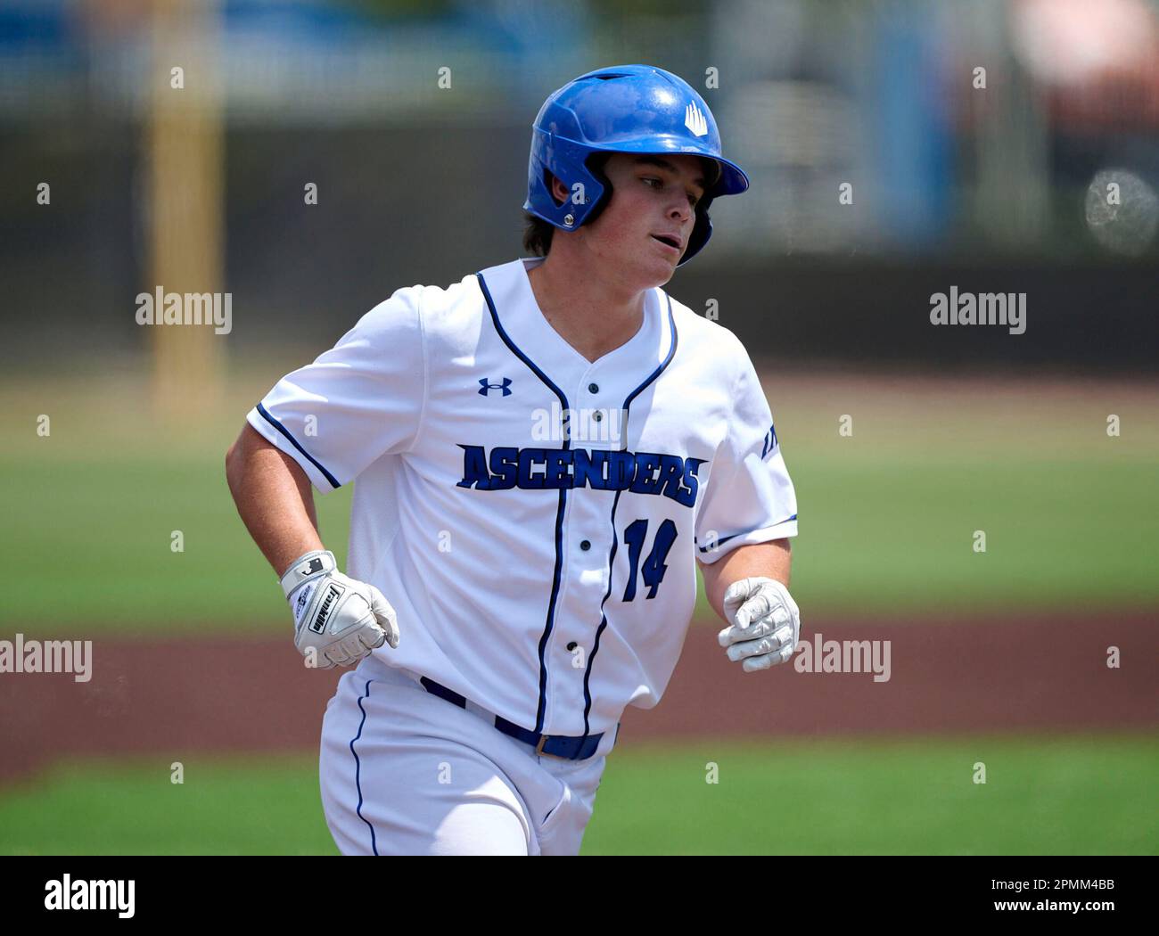IMG Academy Ascenders Cade Ladehoff (14) rounds the bases after hitting ...