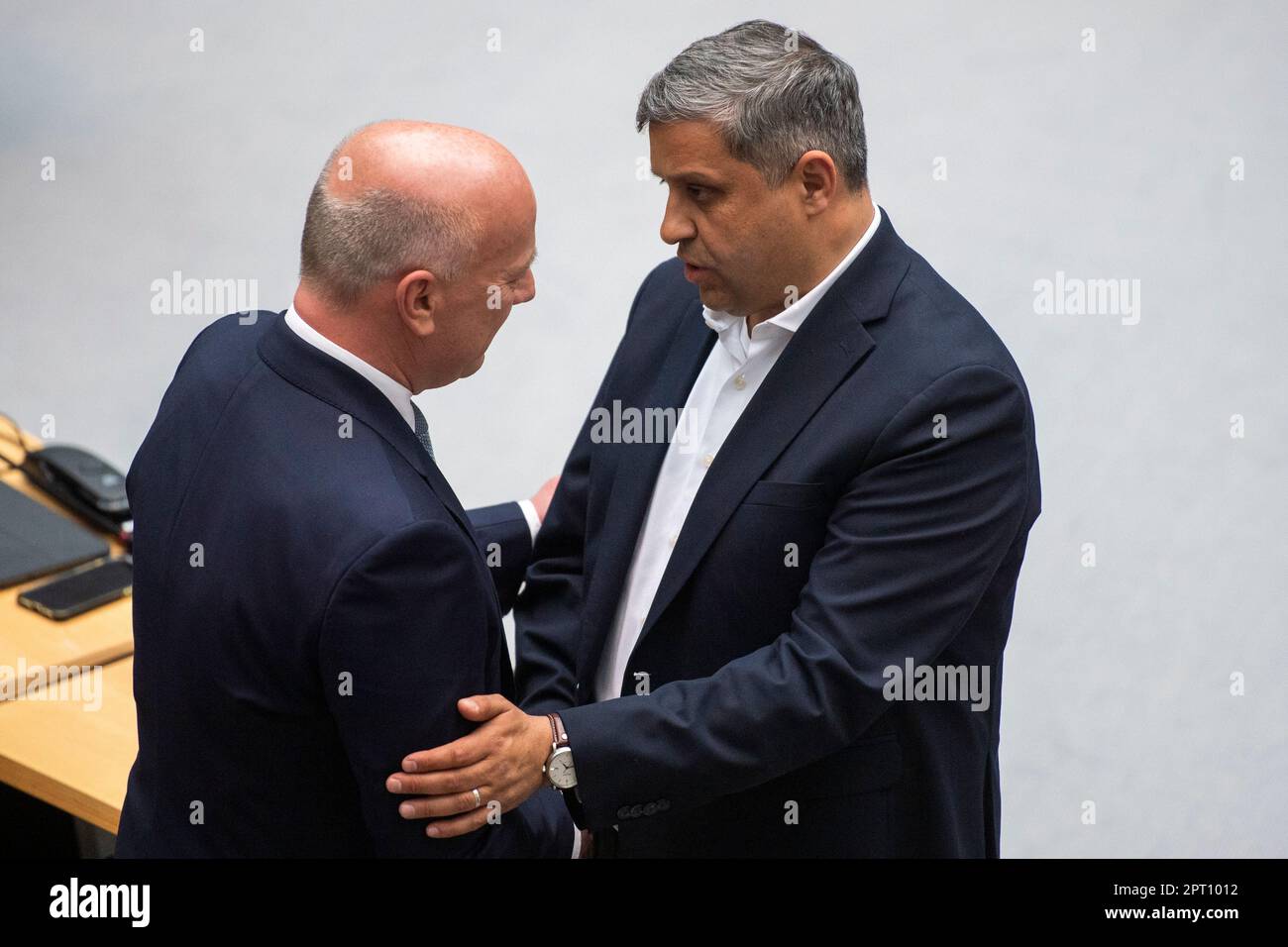 Berlin's new Governing Mayor Kai Wegner, left, is congratulated by ...