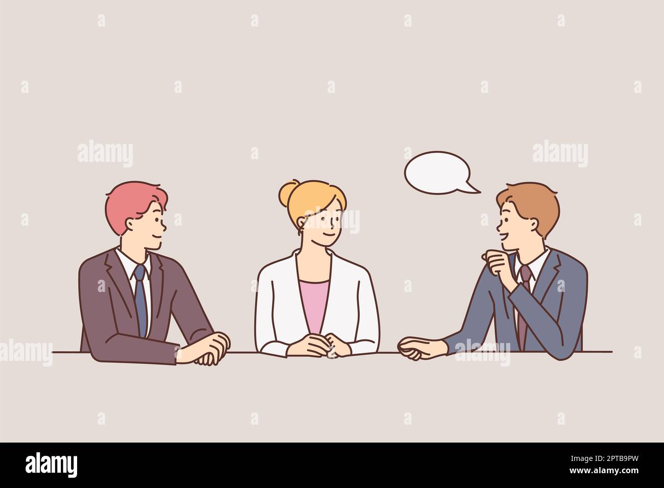 Divers hommes d'affaires s'assoient à leur bureau dans un remue ...