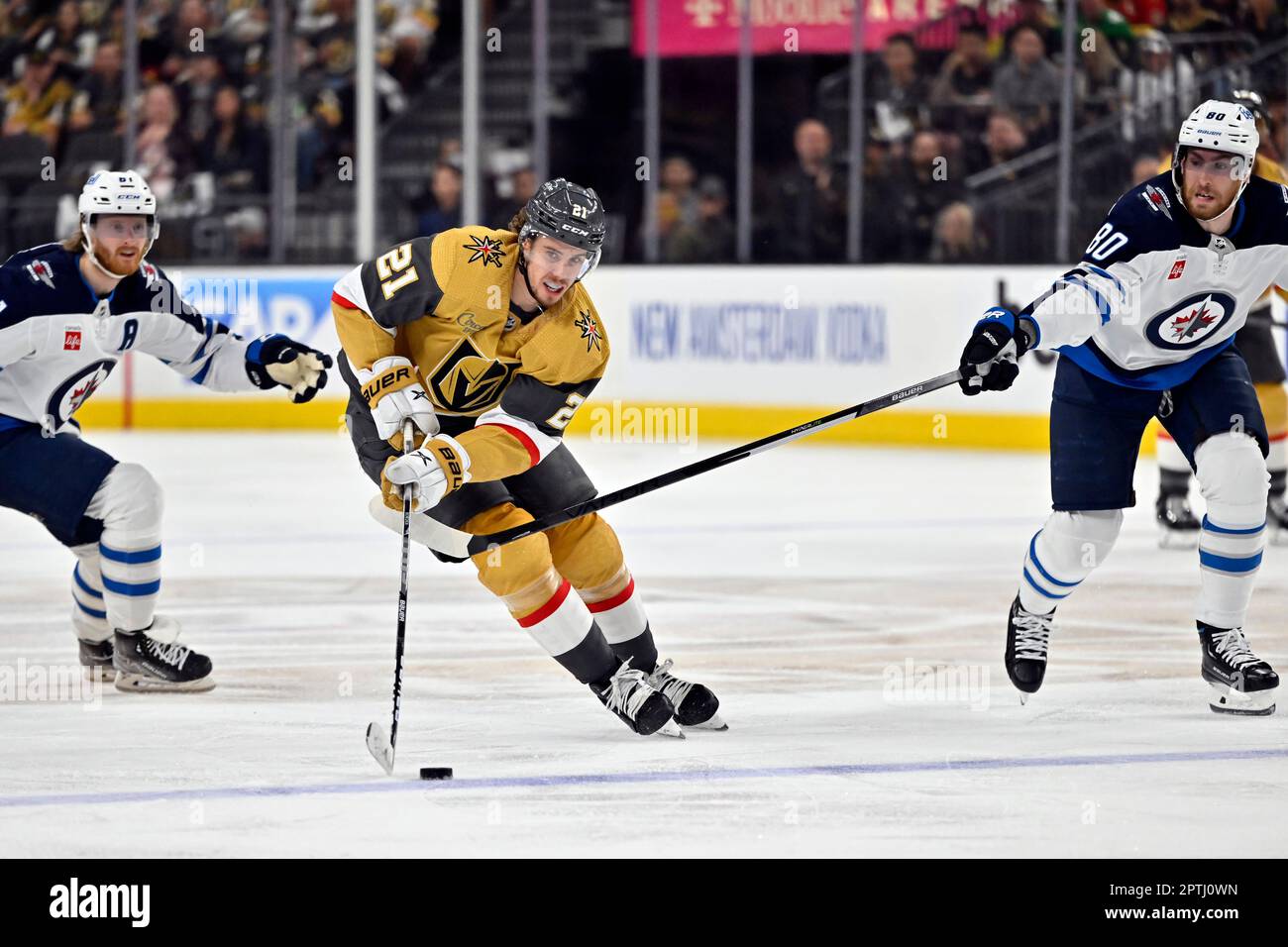Vegas Golden Knights center Brett Howden (21) handles the puck between ...