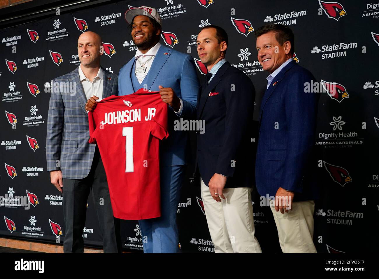 Arizona Cardinals first-round draft pick Paris Johnson Jr., hold jersey ...