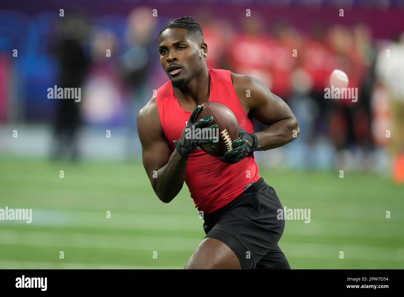 FILE - Michigan State wide receiver Jayden Reed runs a drill at the NFL ...