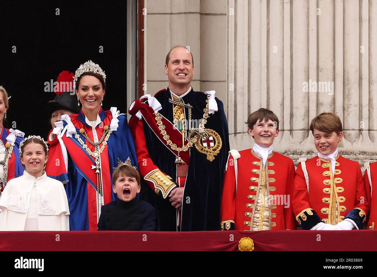 Britain's Prince Louis reacts next to his sister Princess Charlotte ...