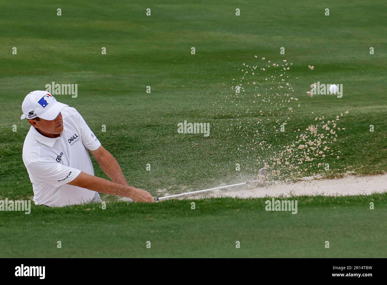 Billy Andrade hits out of the bunker for the second time on the 18th ...