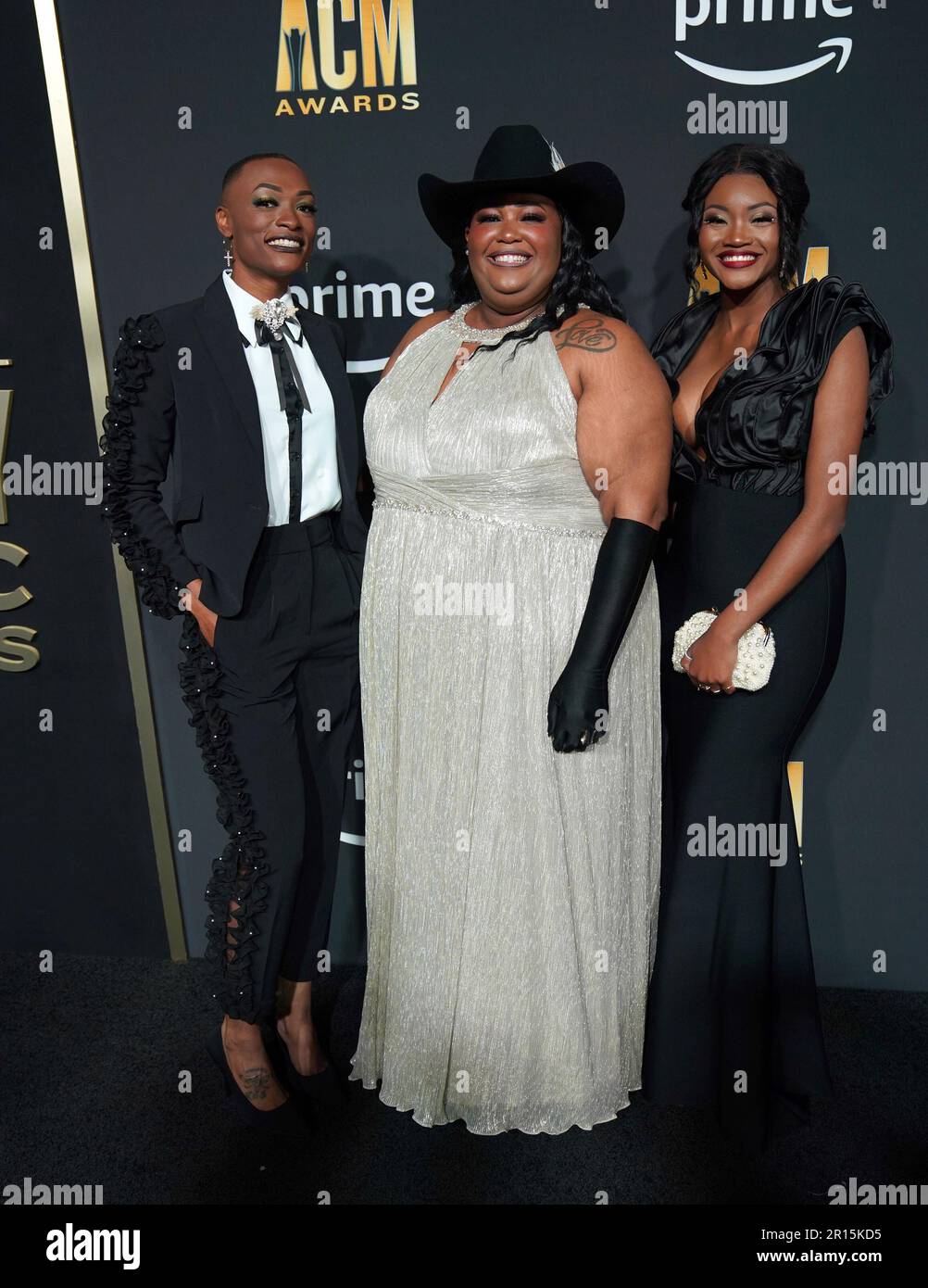 Trea Swindle, from left, Danica Hart, and Devynn Hart, of the musical group Chapel Hart, arrive ...