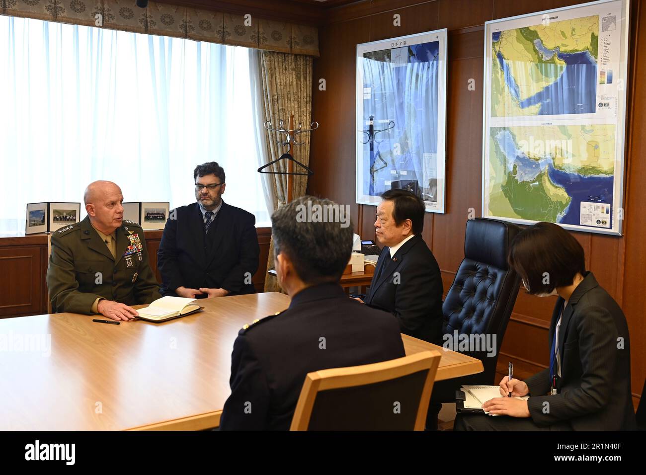 Maj. Gen. David H. Berger, left, commandant of the U.S. Marine Corps ...