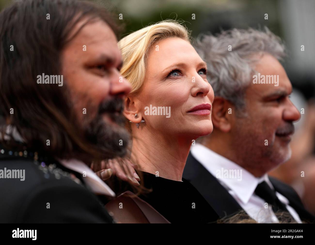 Director Warwick Thornton, from left, Cate Blanchett, and Wayne Blair pose for photographers ...