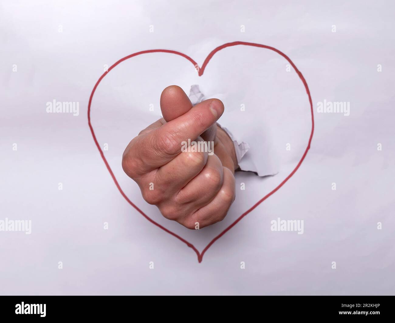 Gros plan d'une main avec le symbole du coeur coréen avec l'index et le ...