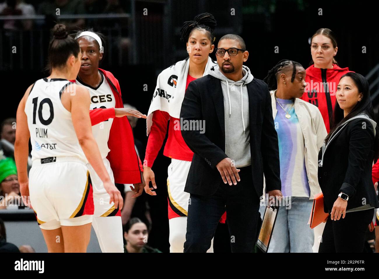 Las Vegas Aces interim head coach Tyler Marsh greets guard Kelsey Plum ...