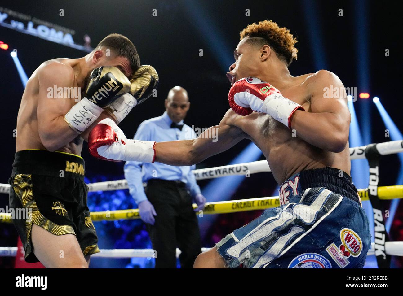 Devin Haney, right, fights Vasiliy Lomachenko in an undisputed ...