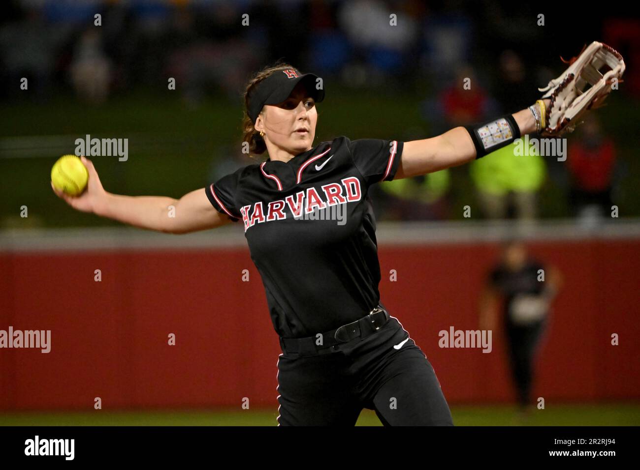 Harvard pitcher Riley Flynn (5) throws against Arkansas during an NCAA ...