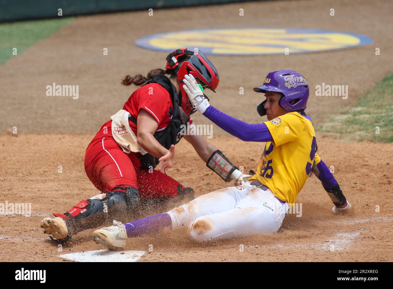 May 21, 2023: LSU's Raeleen Gutierrez (55) slides into home and beats ...