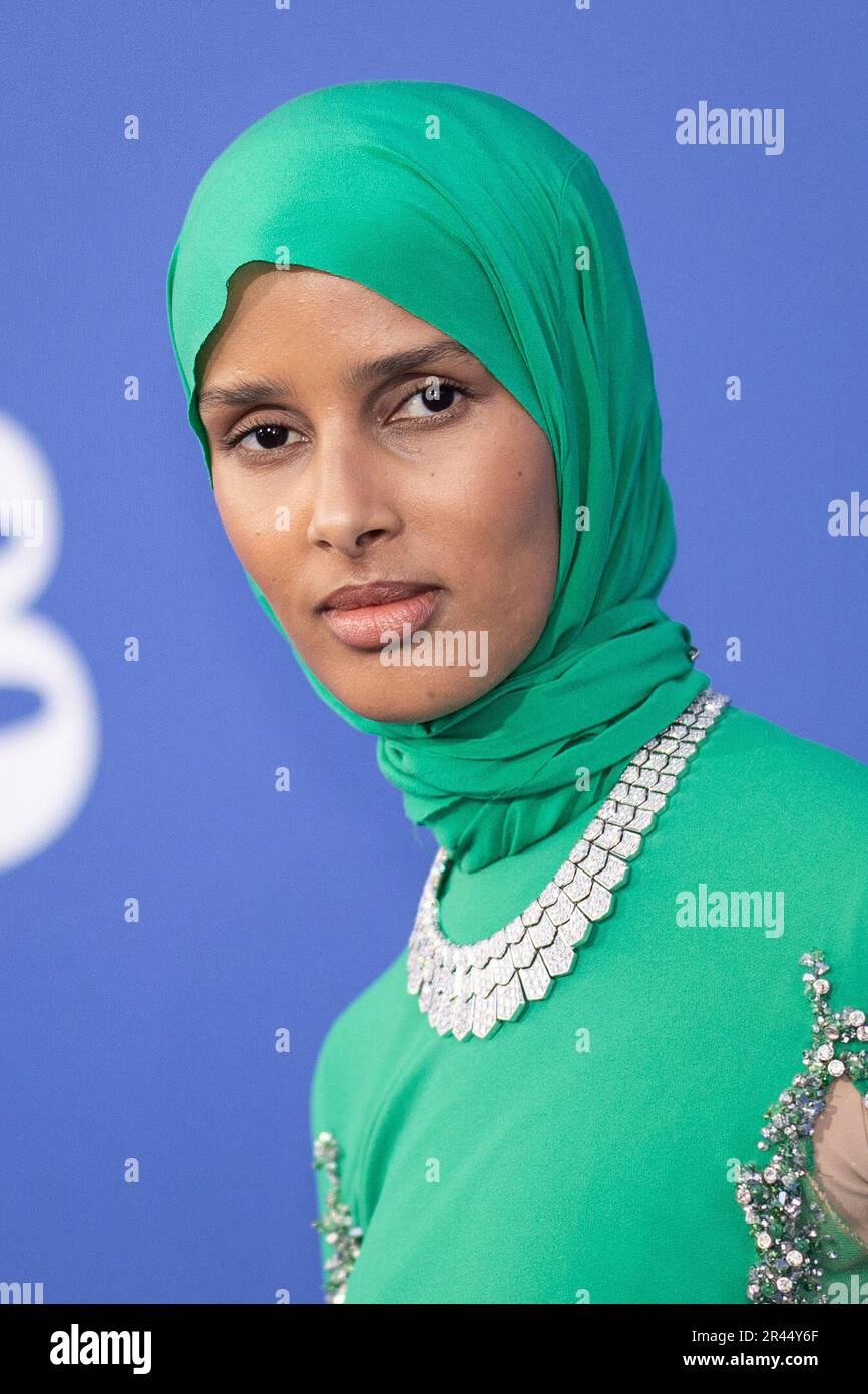 Rawdah Mohamed poses for photographers upon arrival at the amfAR Cinema ...