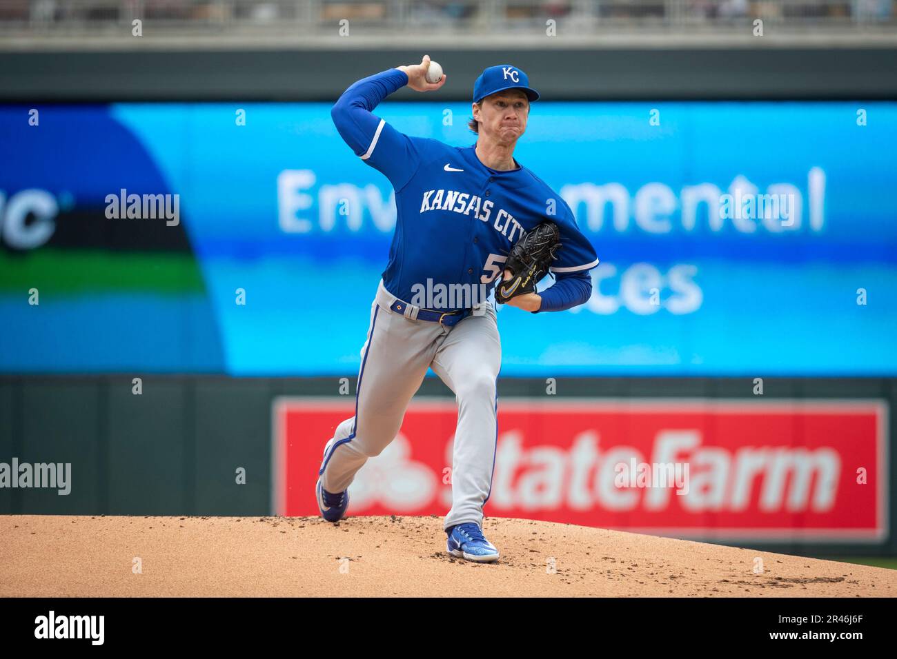 Kansas City Royals starting pitcher Brady Singer throws to the ...