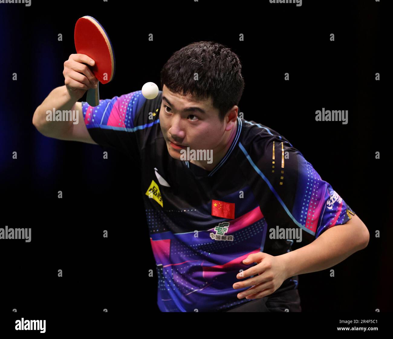 LIANG Jingkun of China competes during men's singles semifinal match ...
