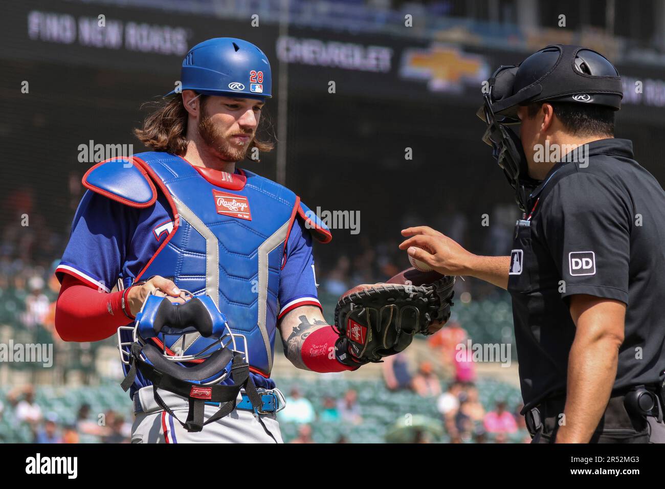 DETROIT, MI - MAY 29: Texas Rangers catcher Jonah Heim (28) gets a new ...