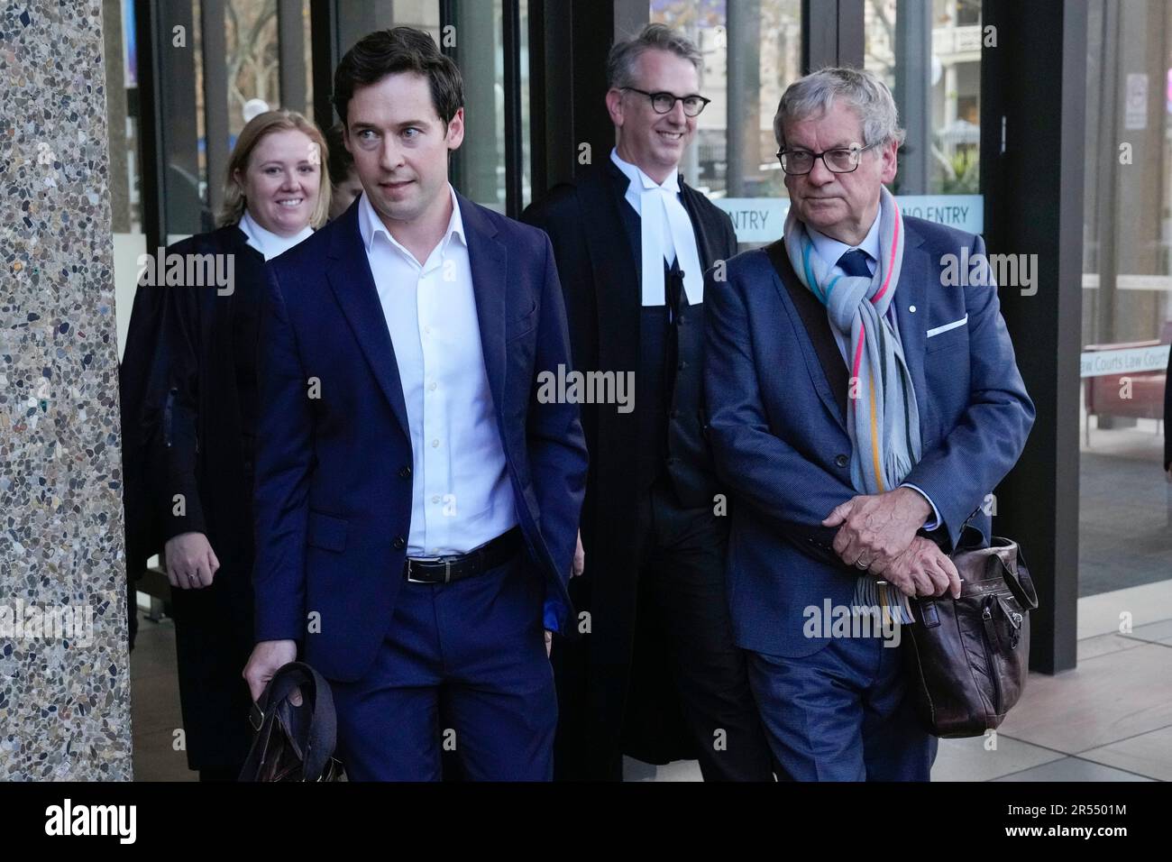 Australian journalists Nick McKenzie, second left, and Chris Masters ...