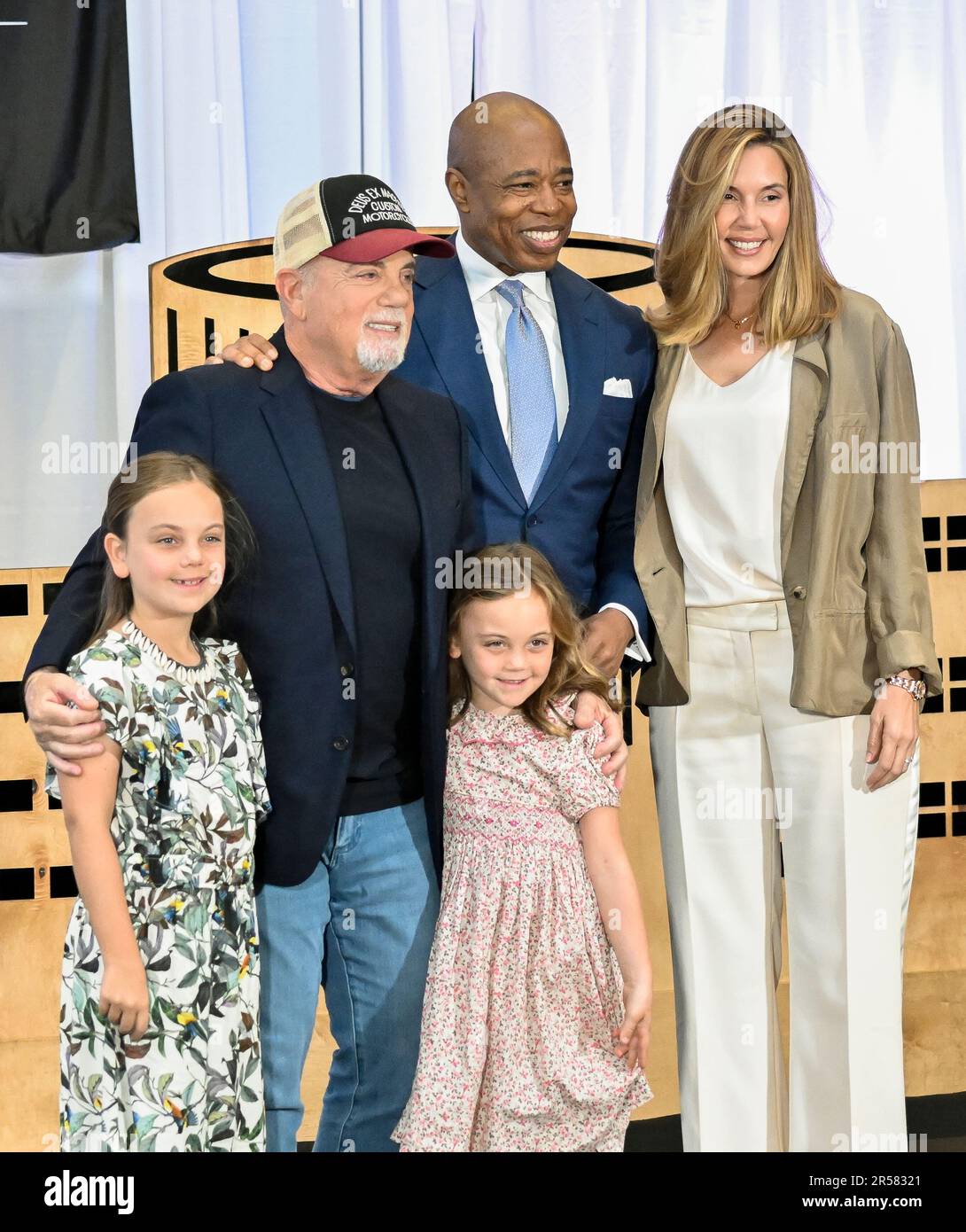 Billy Joel, left, poses with daughters and wife Alexis Roderick and New ...