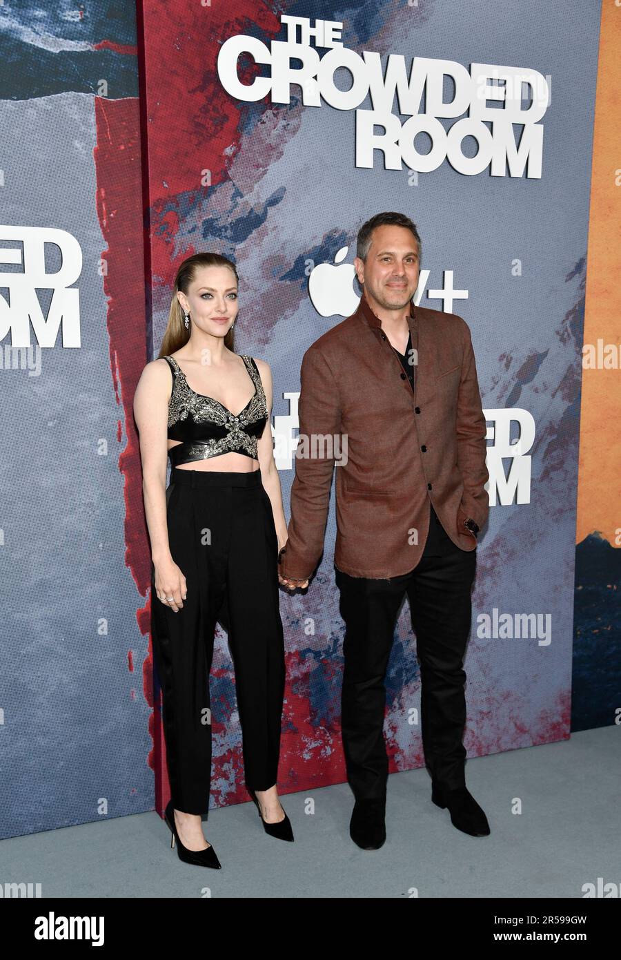 Amanda Seyfried, left, and husband Thomas Sadoski attend the Apple TV+ ...