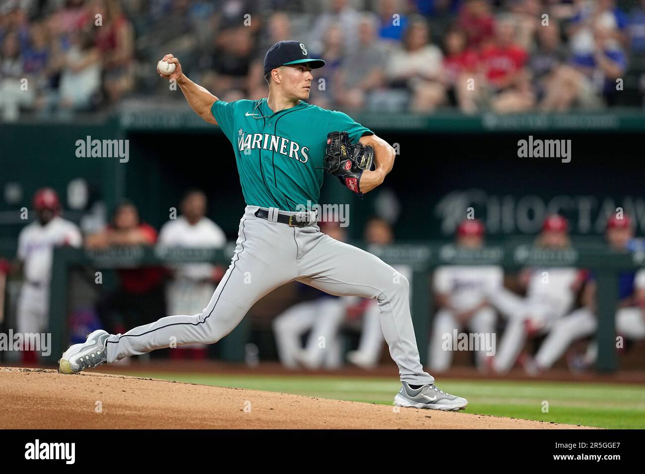 Seattle Mariners starting pitcher Bryan Woo winds up to throw to the ...