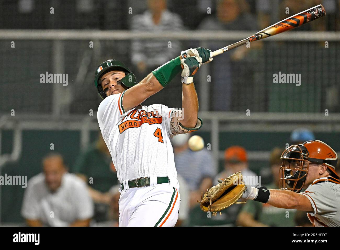 CORAL GABLES, FL - JUNE 03: Miami infielder Blake Cyr (4) hits the ball ...