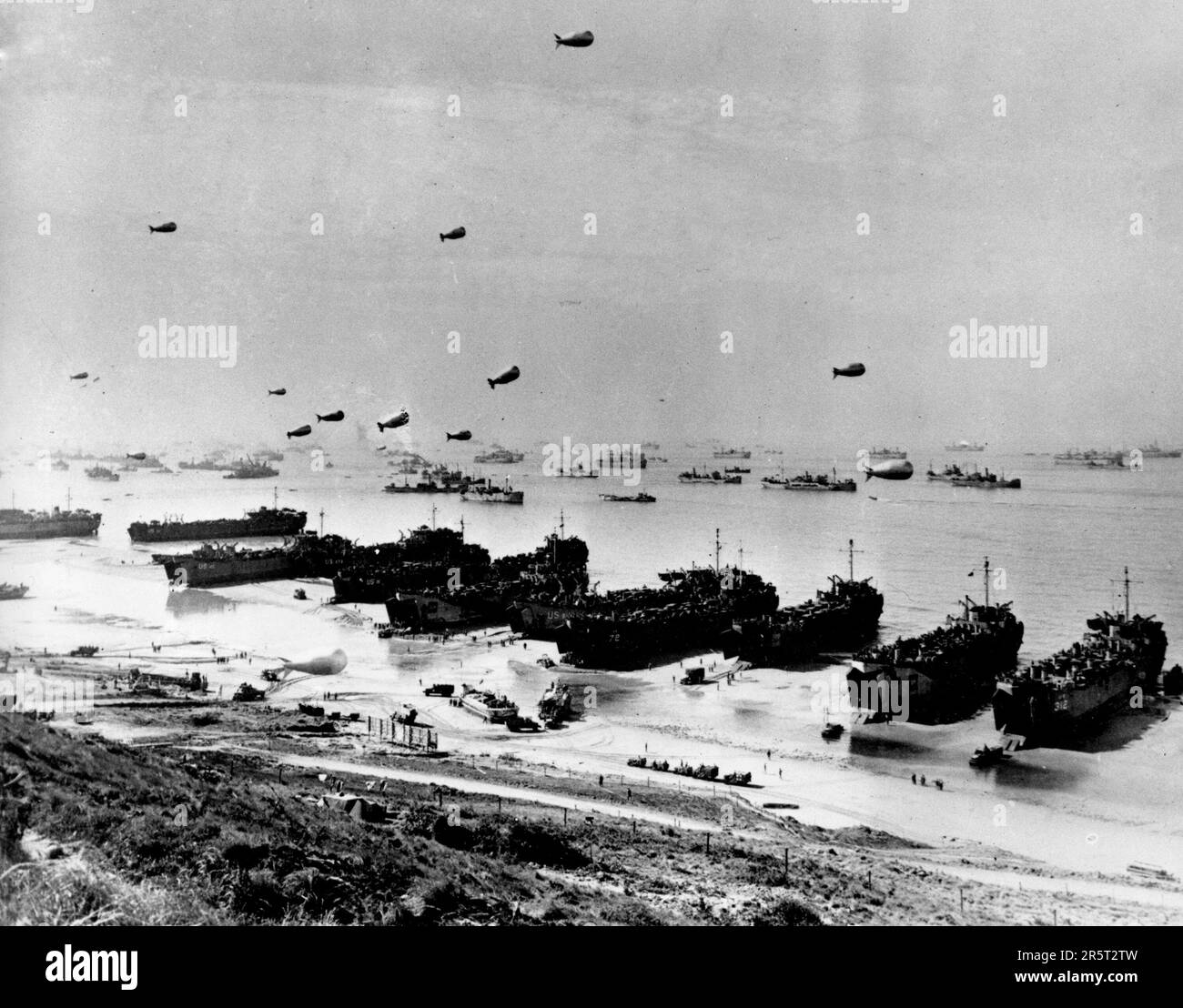 FILE - This is the scene along a section of Omaha Beach in June 1944 ...
