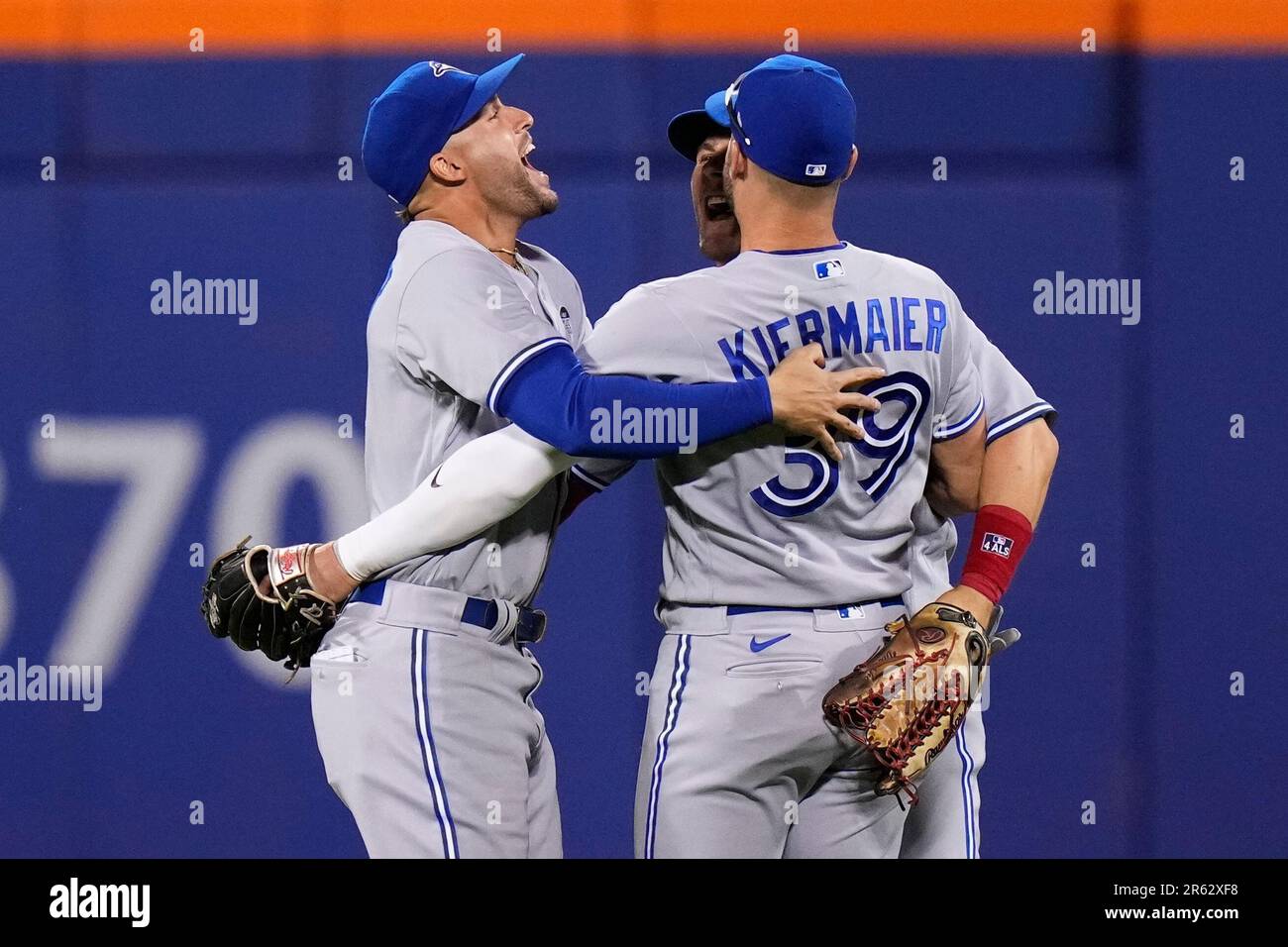 Toronto Blue Jays' George Springer, left, celebrates with teammates ...