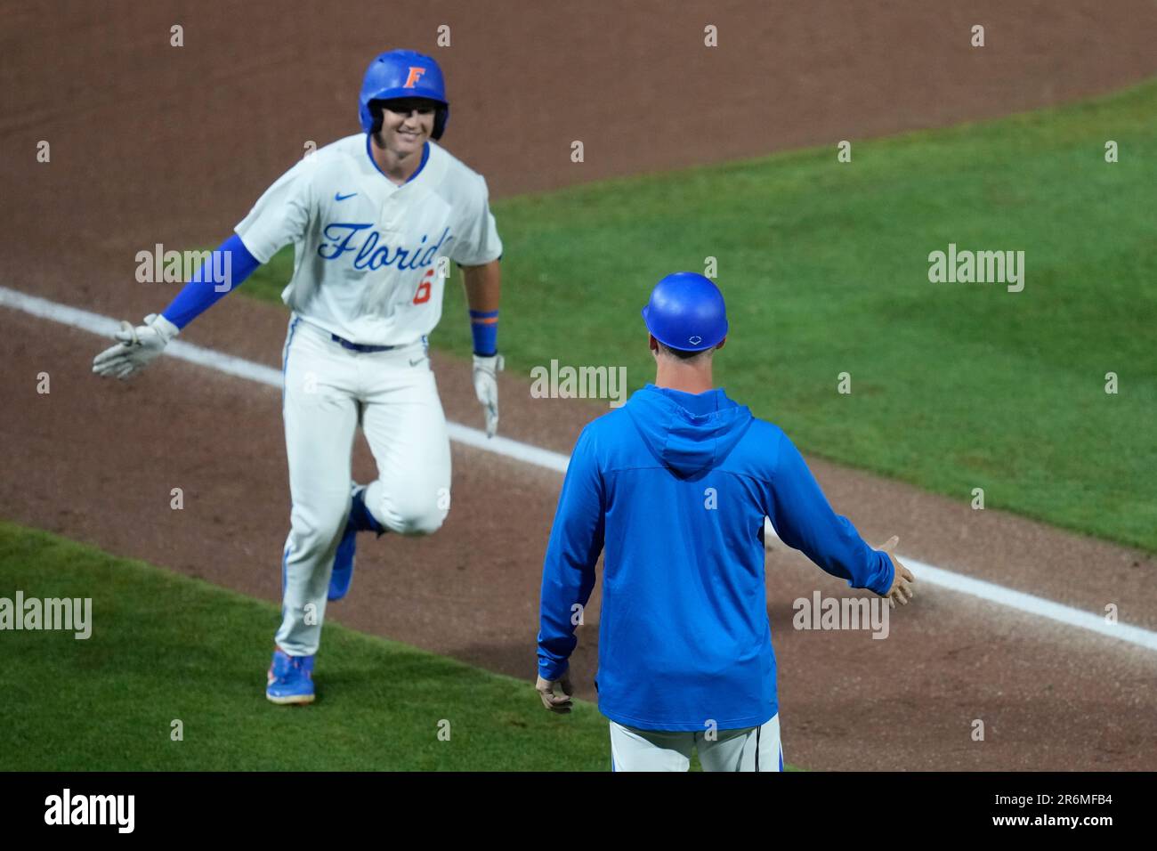 Florida's Tyler Shelnut (6) rounds the bases after hitting a home run ...