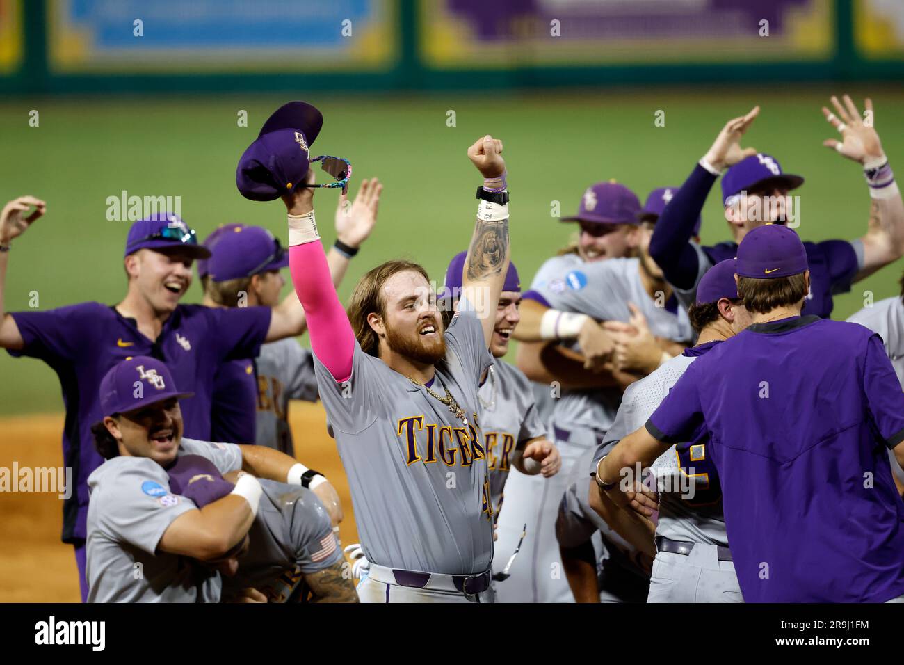 LSU infielder Tommy White (47) celebrates with their team after ...