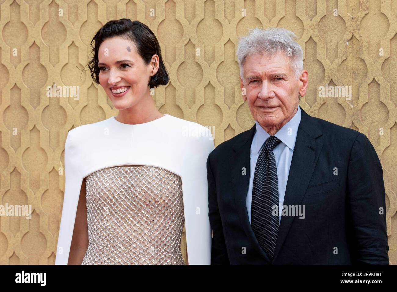 Phoebe Waller-Bridge, left, and Harrison Ford, pose for photographers ...