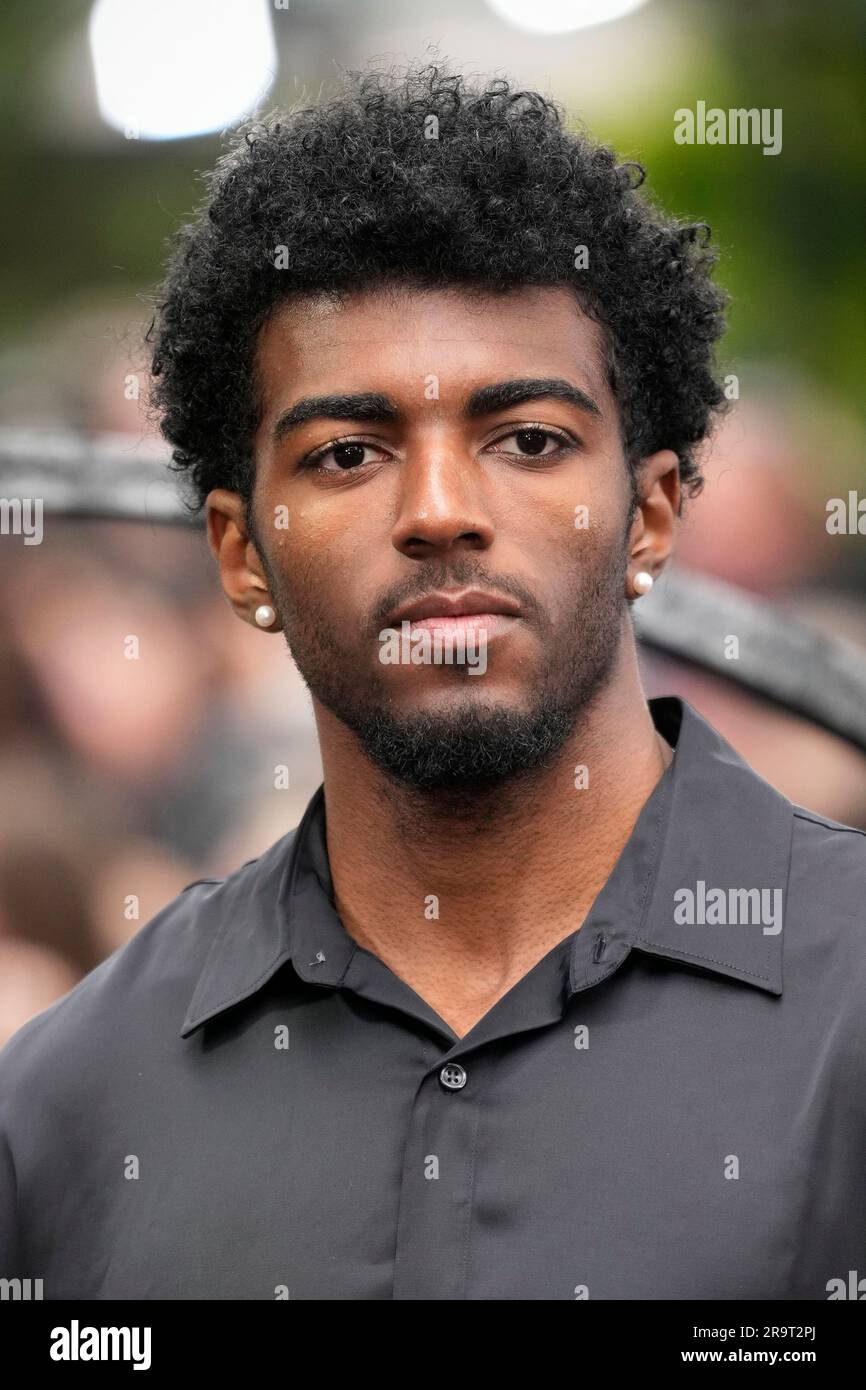 Wilson Mbomio poses for photographers upon arrival at the World ...