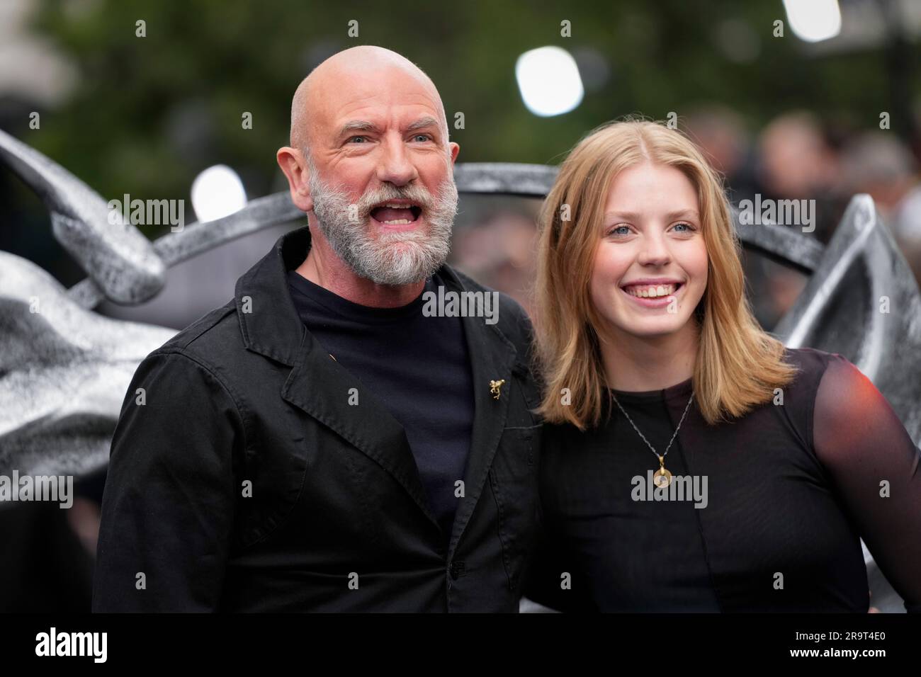 Graham McTavish, left, and daughter pose for photographers upon arrival ...