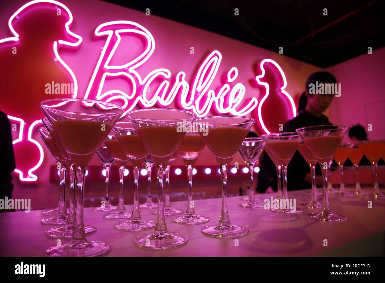FILE - Barbie cocktails are prepared for guests at the opening ceremony ...